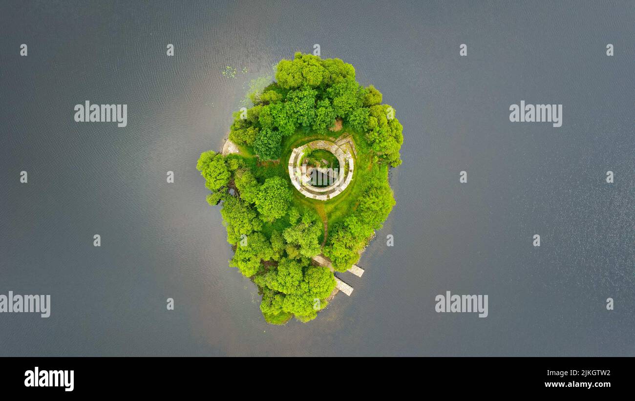 An aerial view of the Cloughoughter Castle on Lough Oughter lake ...
