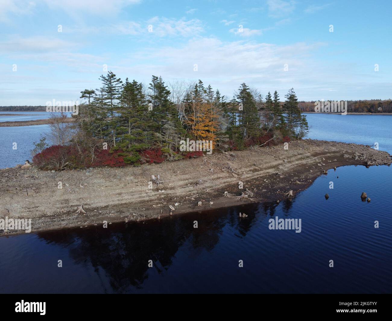 An aerial view of a small island with trees Stock Photo - Alamy