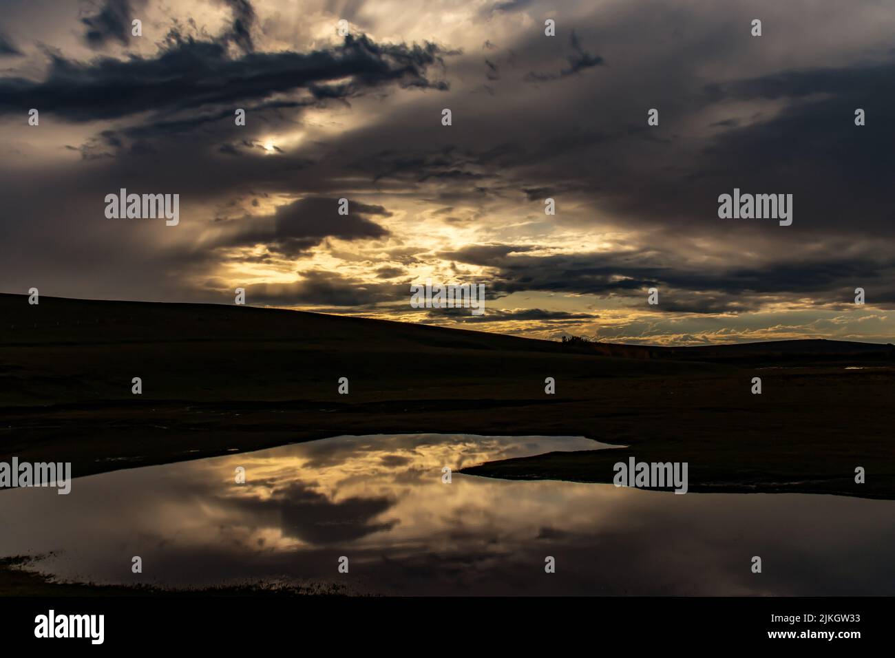 The Hulunbuir grassland riverside landscape at sunset, Inner Mongolia ...