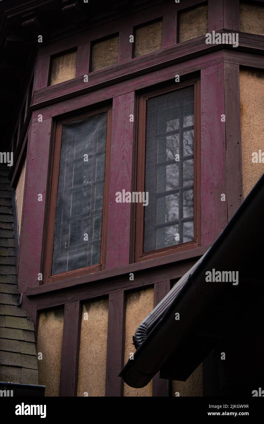 A vertical of the exterior of a two-storey old wooden building Stock ...