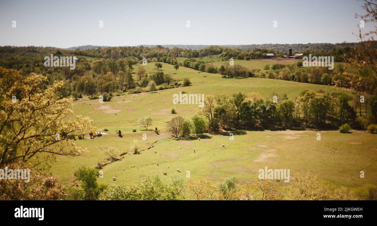 A beautiful farm landscape with rolling hills Stock Photo - Alamy