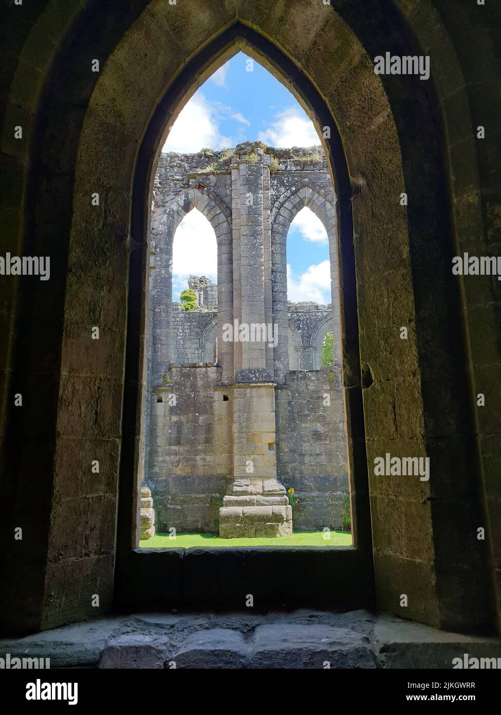 A view of ancient ruins from an arch window Stock Photo - Alamy