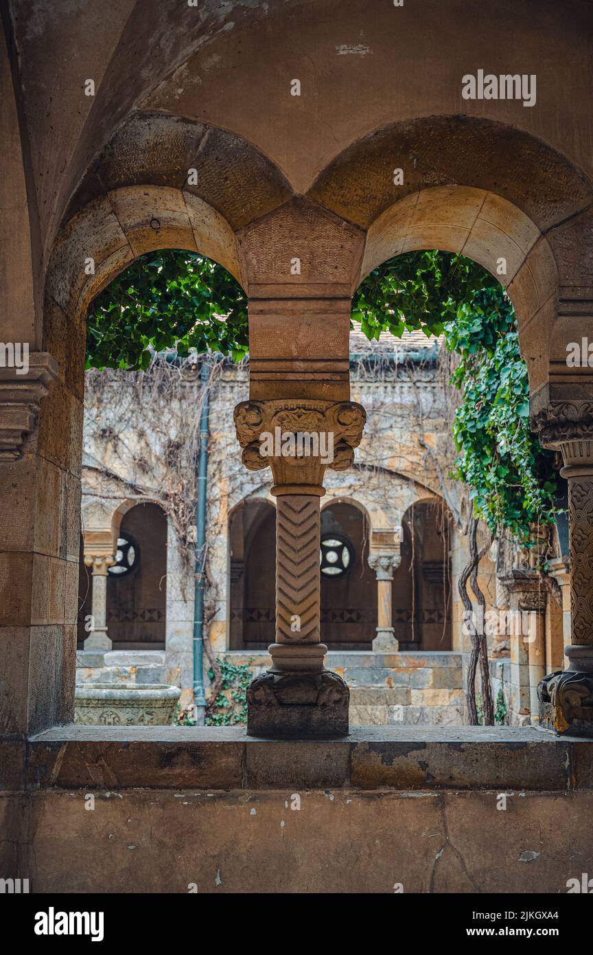 The beautiful columns of the historic monastery Stock Photo - Alamy