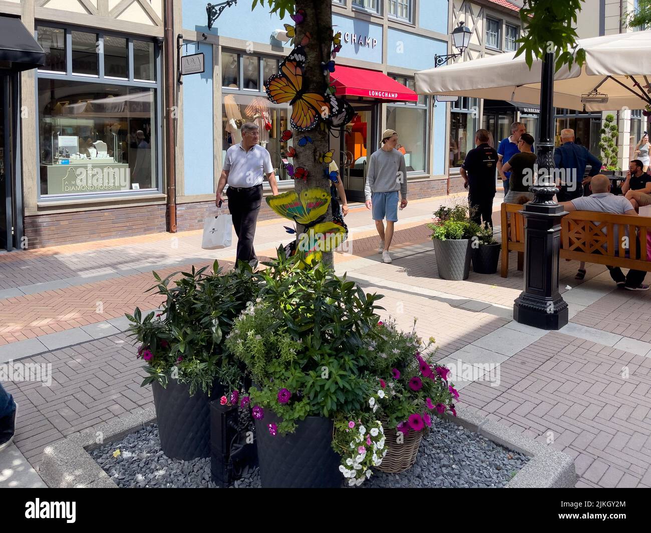 Crowd of people walking on the street in Roermond Stock Photo - Alamy