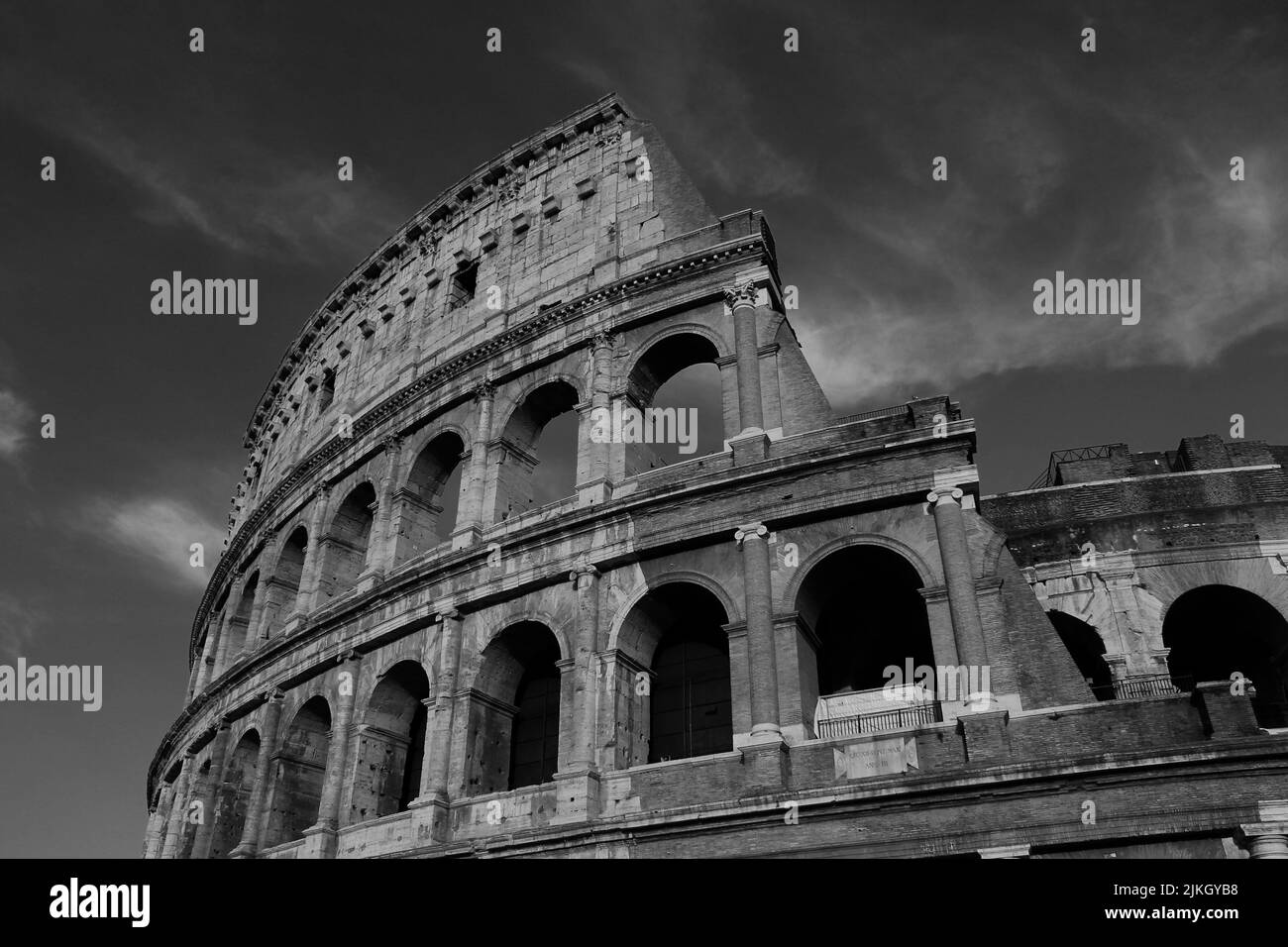 close-up of part of the facade of the coliseum in black and white Stock ...