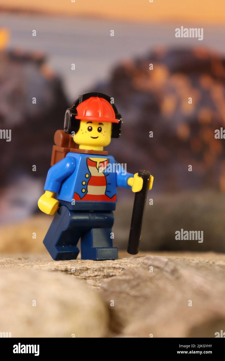 Toy male hiking figure. Hiker in the mountains wearing headphone Stock ...