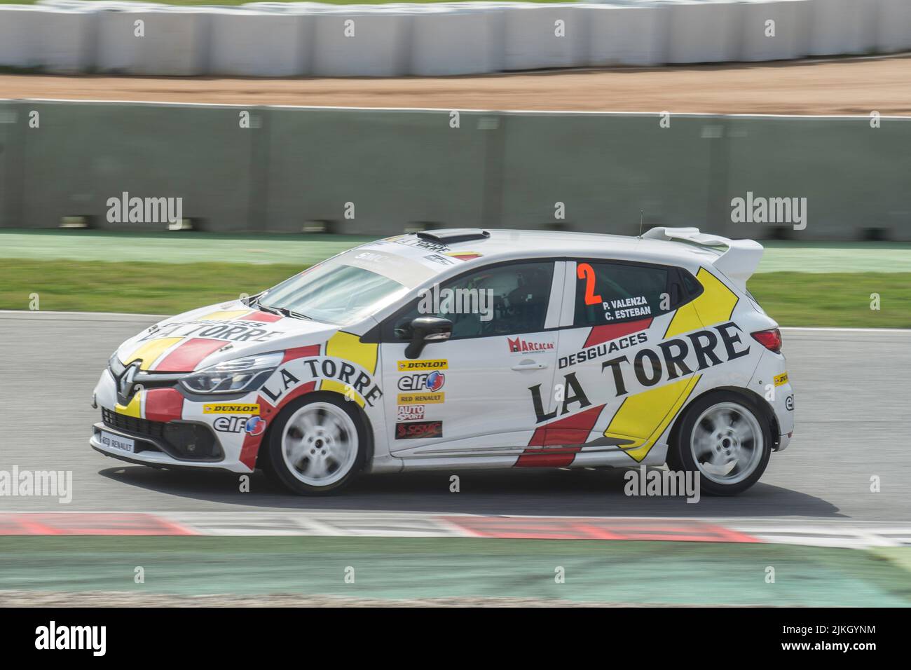 racing car in the asphalt track. Renault clio Stock Photo - Alamy