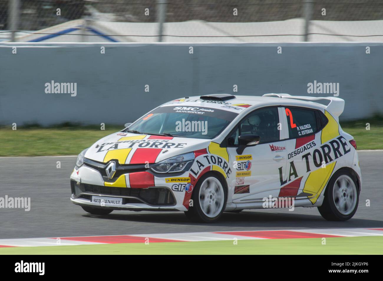 racing car in the asphalt track. Renault clio Stock Photo - Alamy