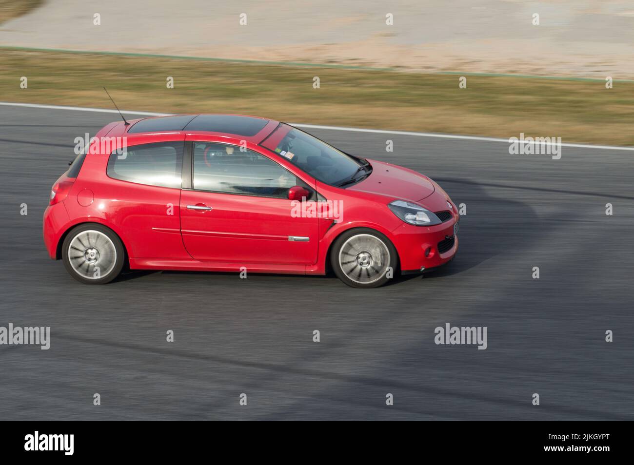 racing car in the asphalt track. Renault clio Stock Photo - Alamy