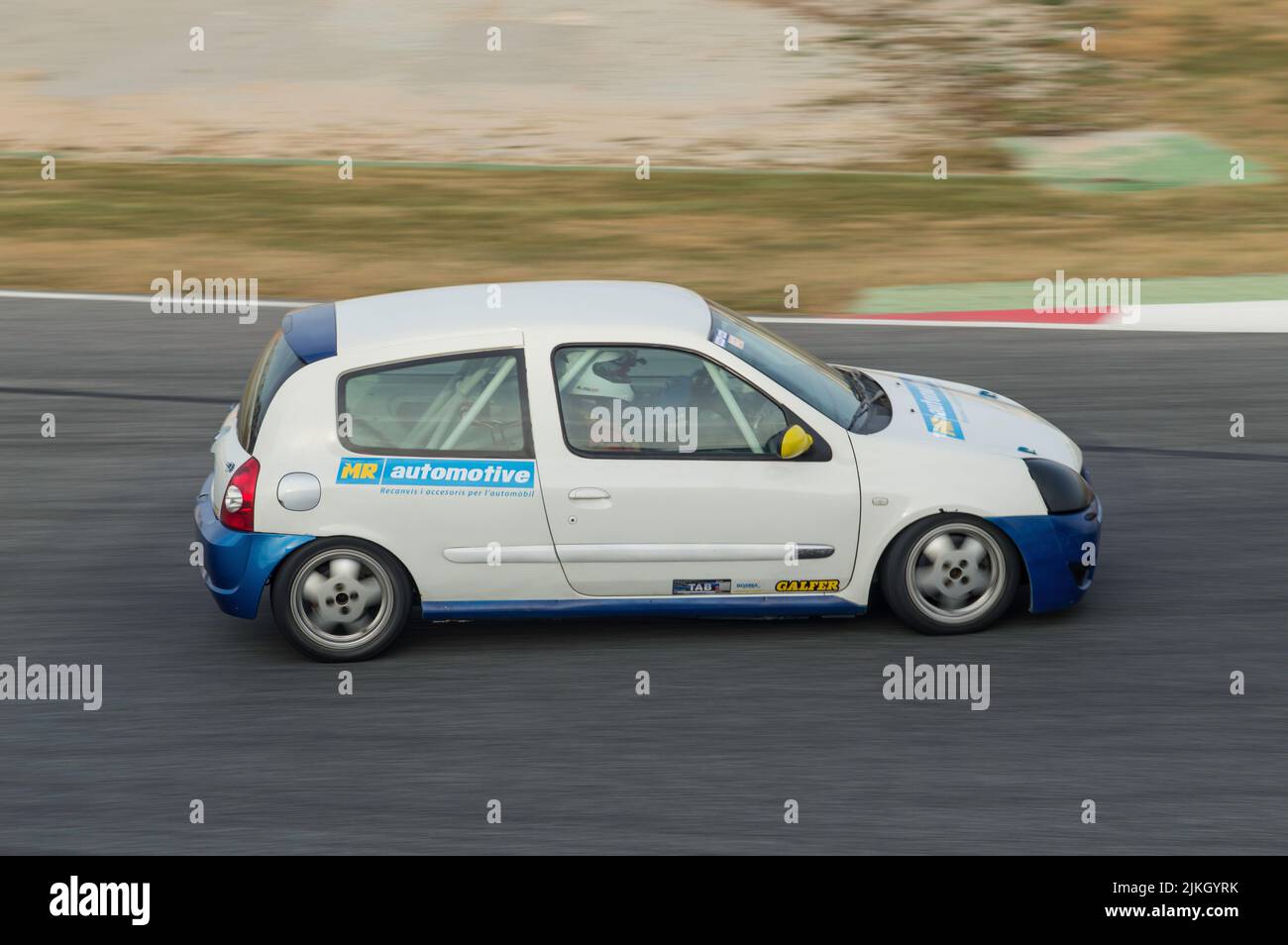 racing car in the asphalt track. Renault clio Stock Photo - Alamy