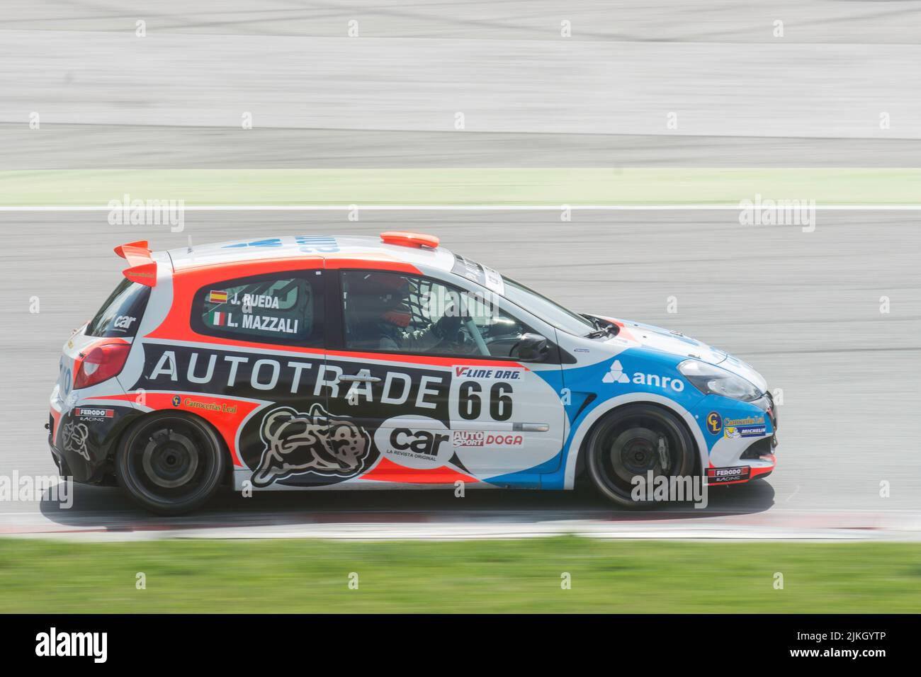 racing car in the asphalt track. Renault clio Stock Photo - Alamy