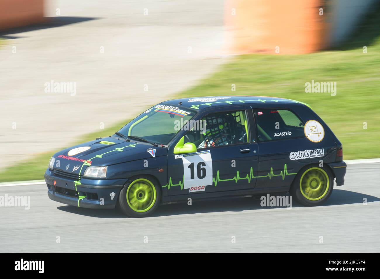 racing car in the asphalt track. Renault clio Stock Photo - Alamy