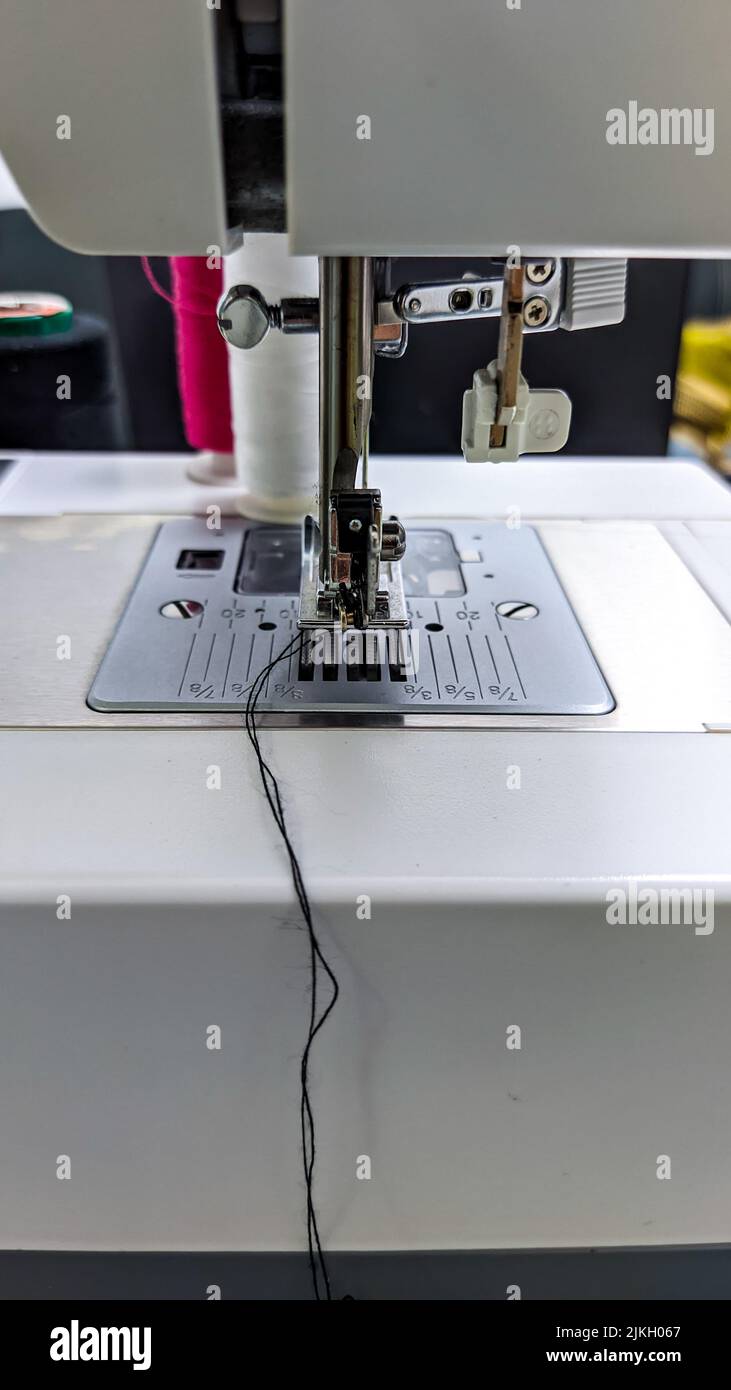 How to thread a sewing machine hi-res stock photography and images - Alamy