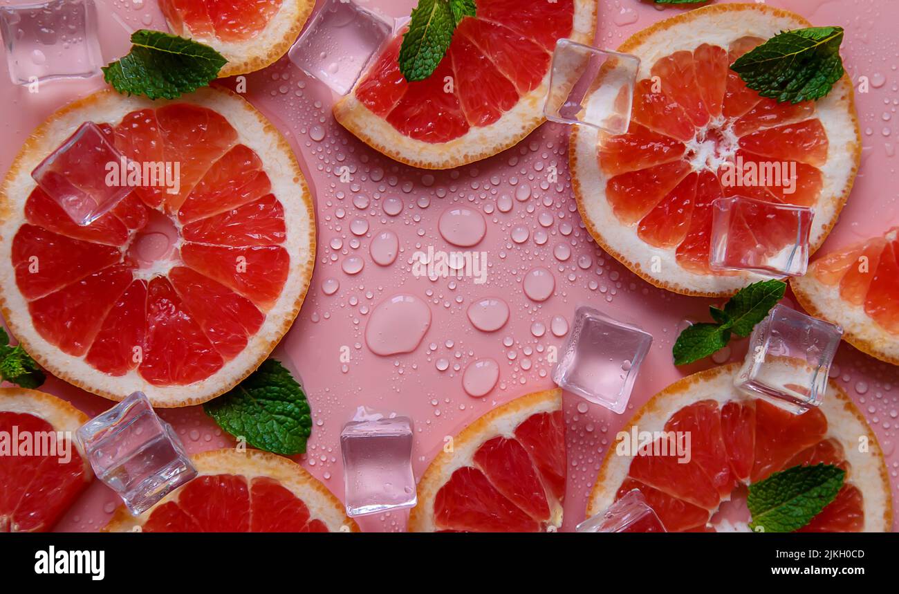 Background with grapefruit and water drops. Selective focus. Spa Stock ...