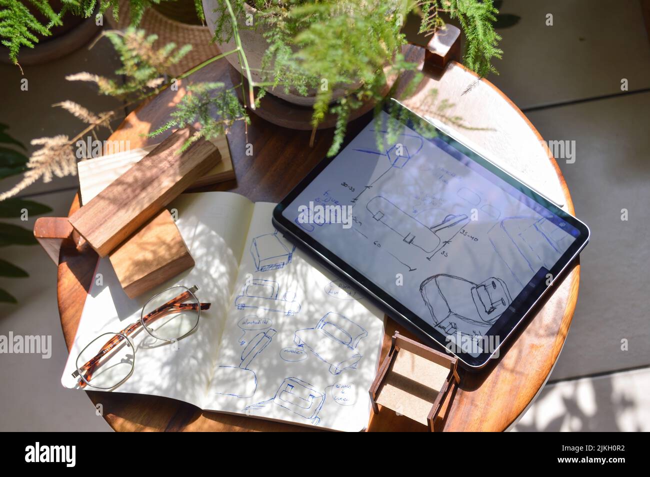 furniture design, digital drawing in tablet and analog in notebook ...