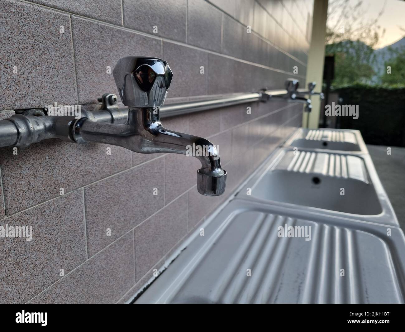 Metallic water tap hi-res stock photography and images - Alamy