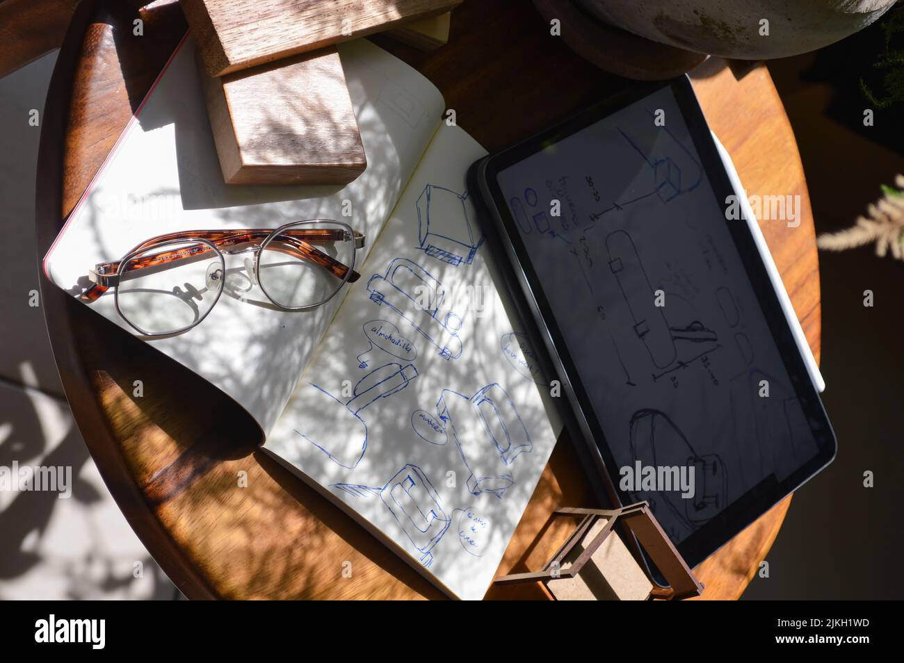 furniture design, digital drawing in tablet and analog in notebook ...