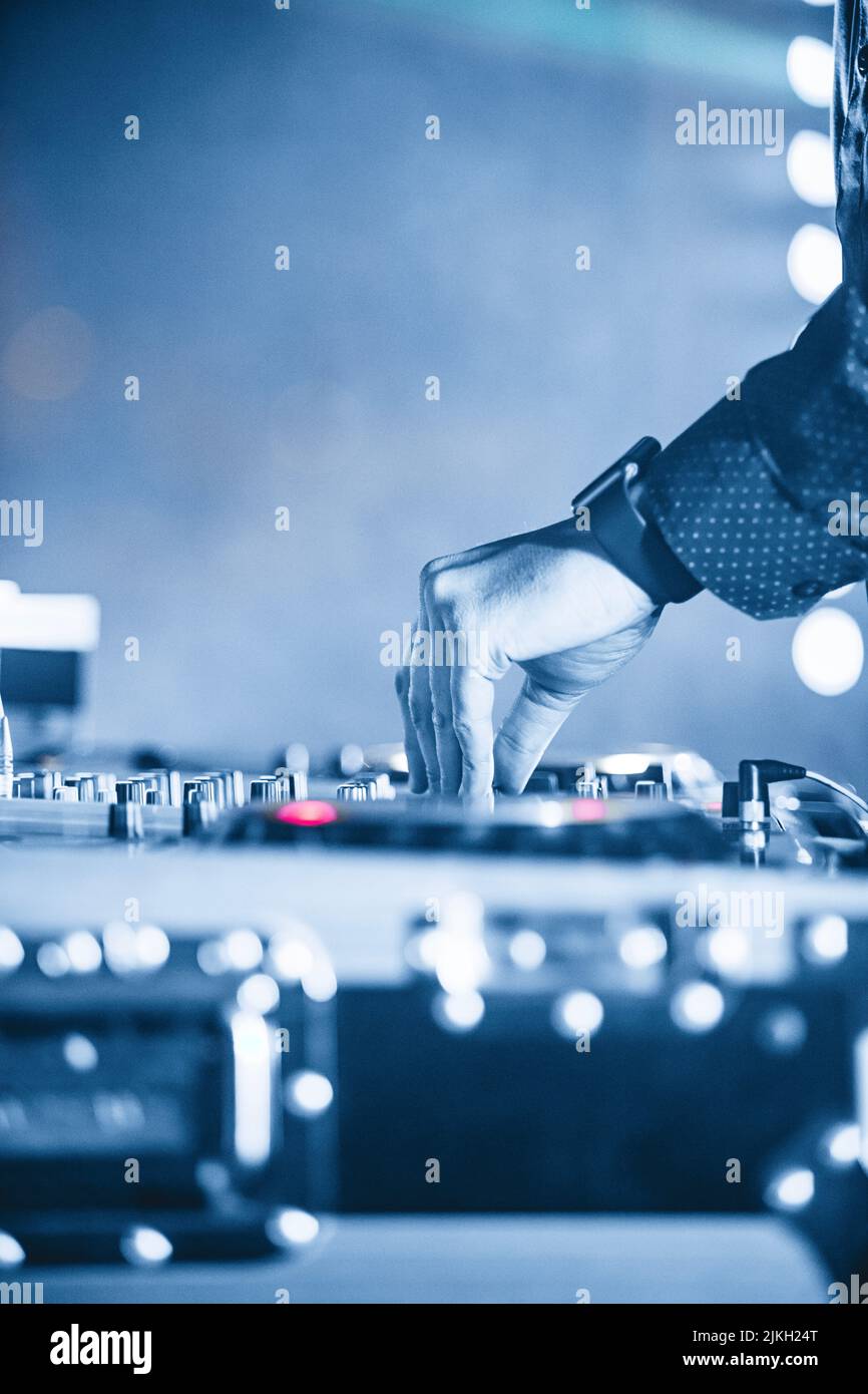 Djs hand turning knob hi-res stock photography and images - Alamy