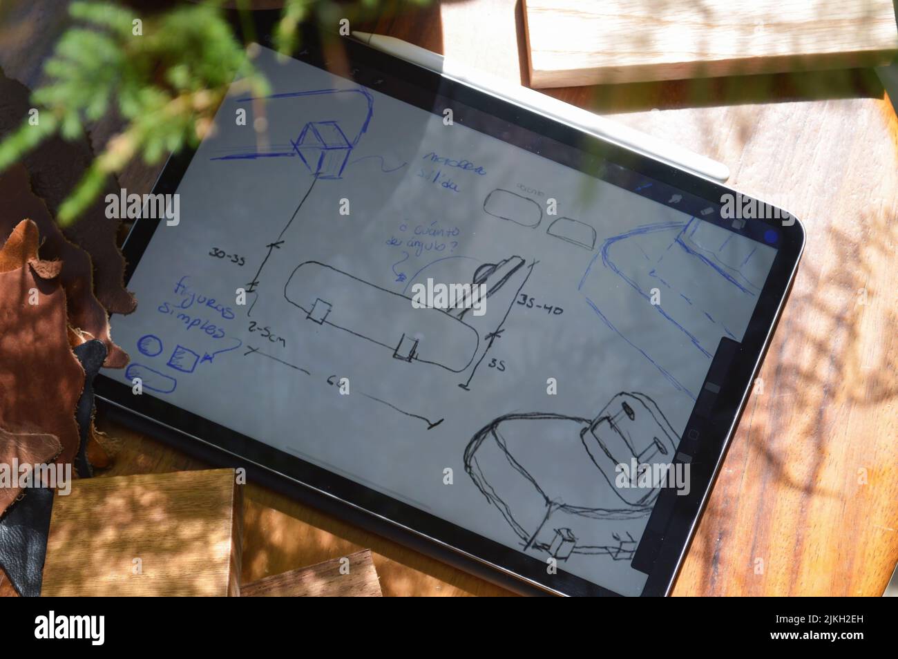 furniture design, digital drawing in tablet and analog in notebook ...