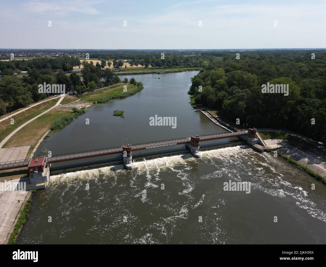 An aerial view of a big dam over a river in picturesque area Stock ...