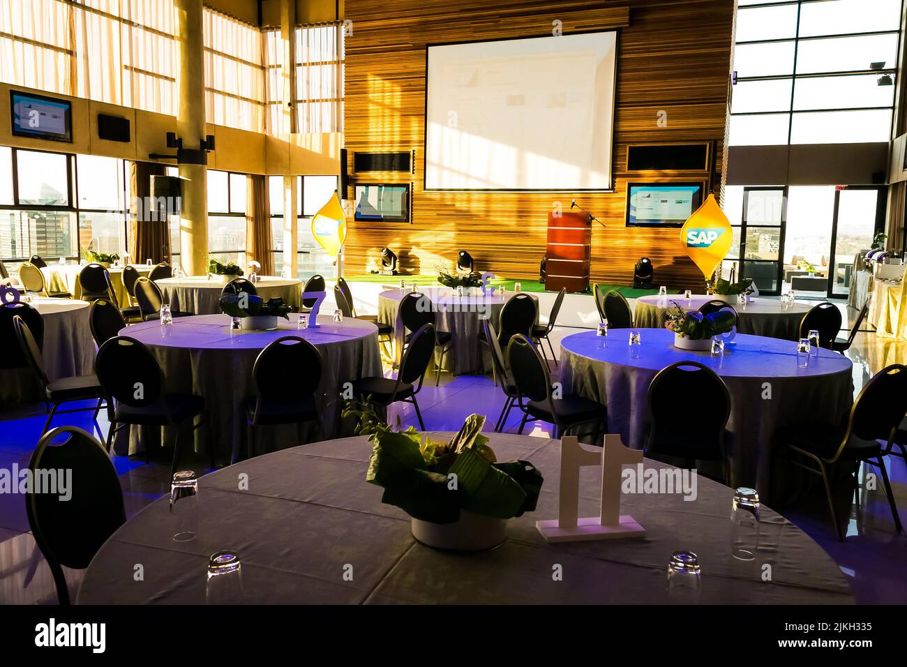 The interior setup of a corporate event presentation venue in ...