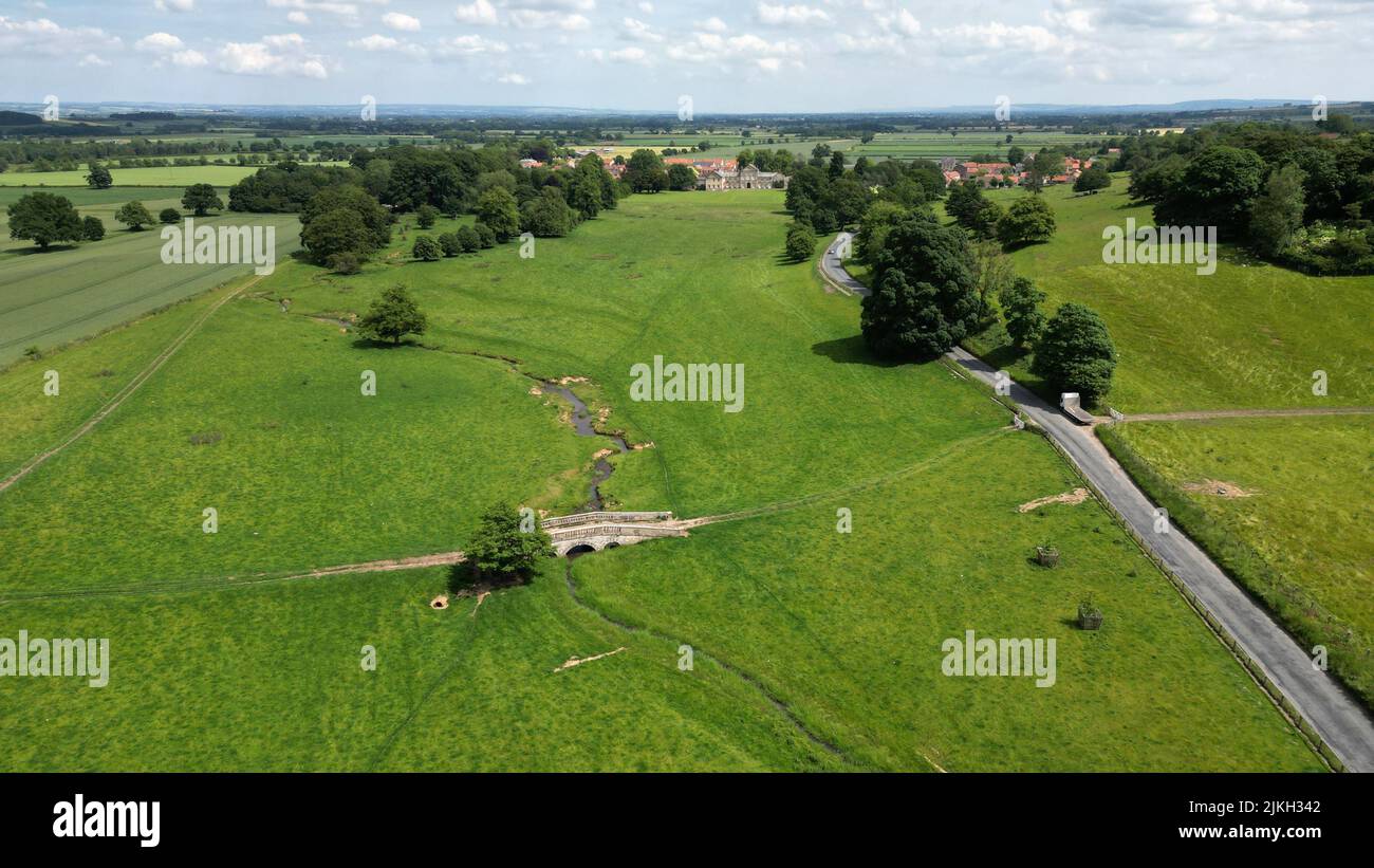 An aerial view of scenic green landscape and the Pickering bridge in ...