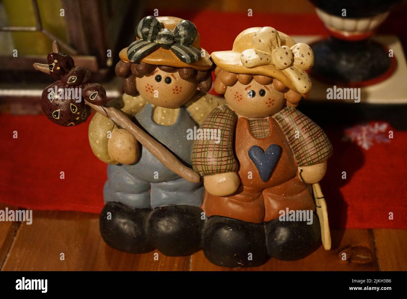 A close-up shot of two plus-size women figurines Stock Photo - Alamy