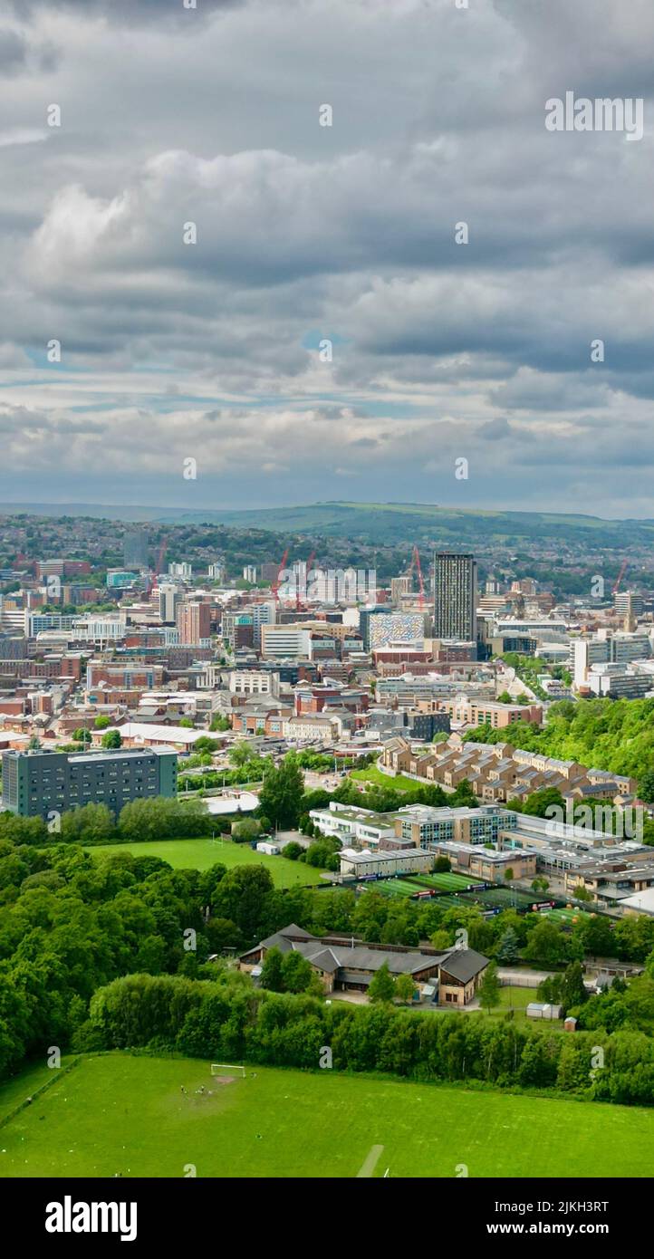 An aerial view of the beautiful cityscape of Sheffield on a cloudy day ...