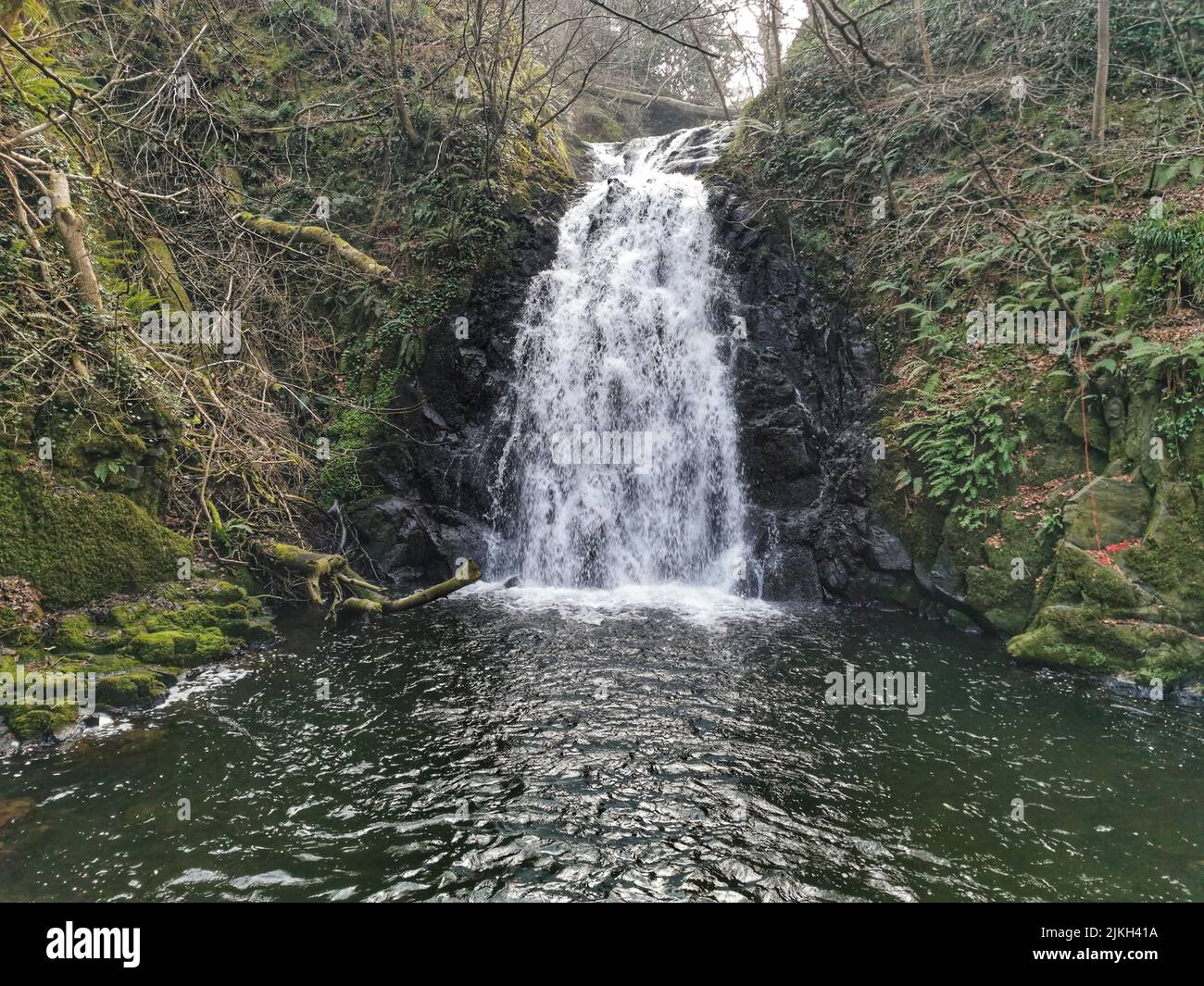 A beautiful scene of Gleno Waterfall in Country Antrim, Northern ...