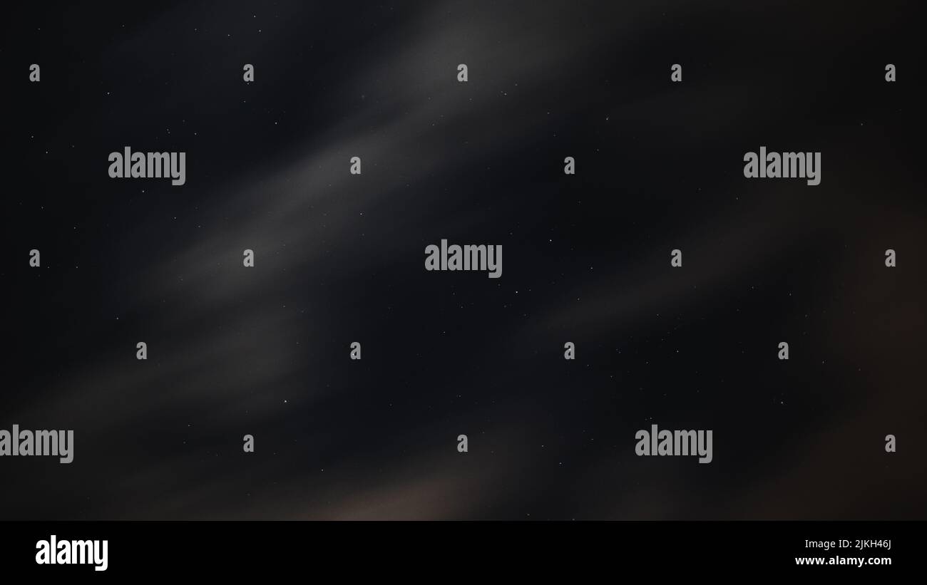 A low angle shot of a long exposure of star sky Stock Photo - Alamy