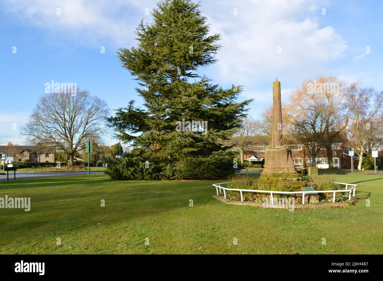 An old sandstone pillar-shaped monument in Meriden village stands on ...