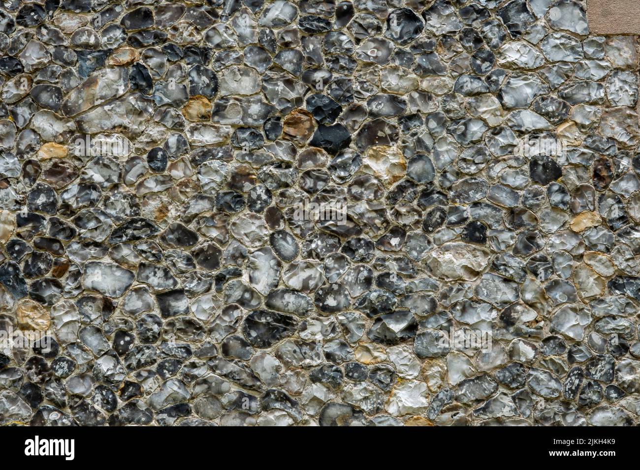 Section of flushwork flint wall Stock Photo - Alamy