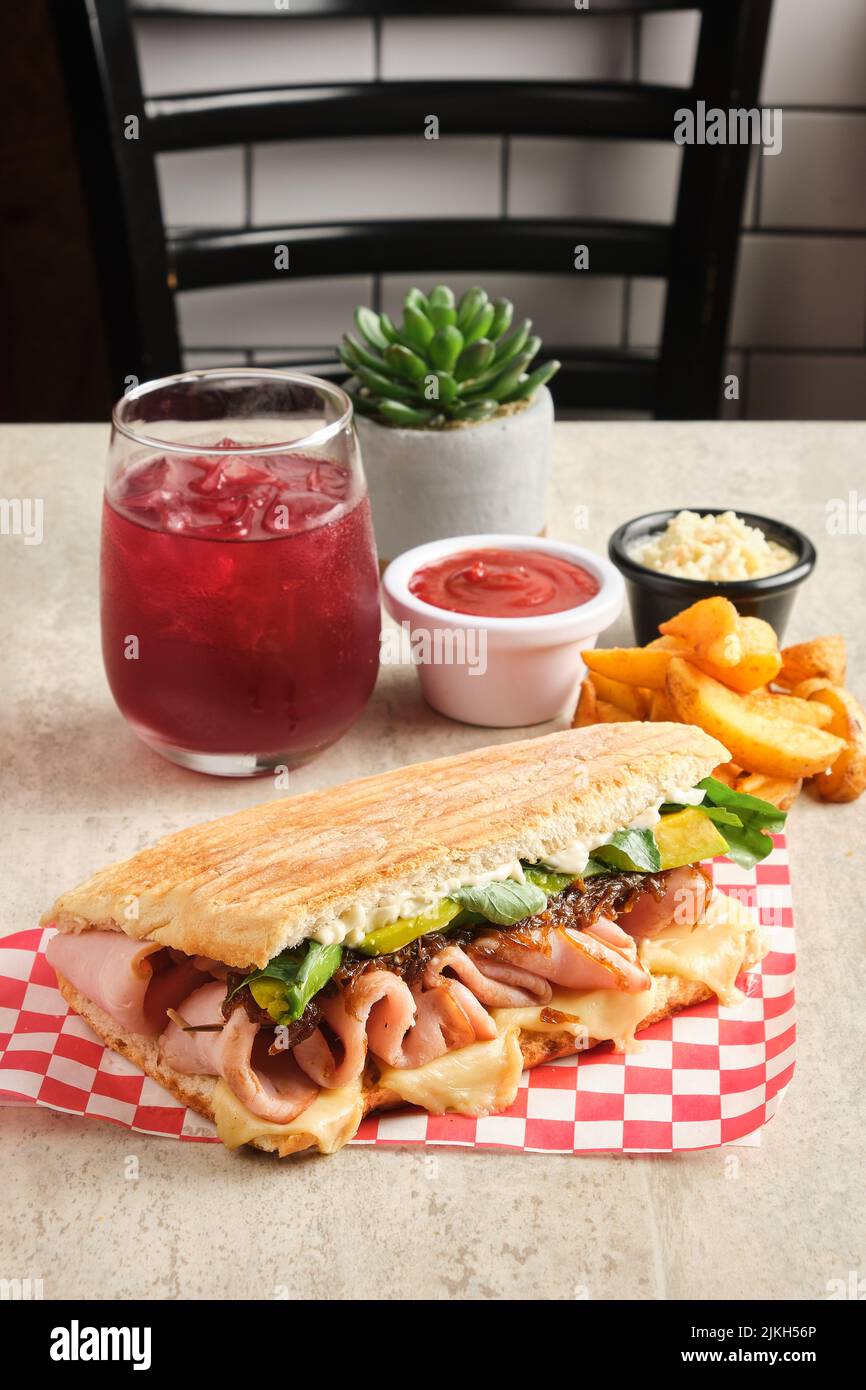 A fresh panini with ham, avocado, cheese, and spinach Stock Photo - Alamy