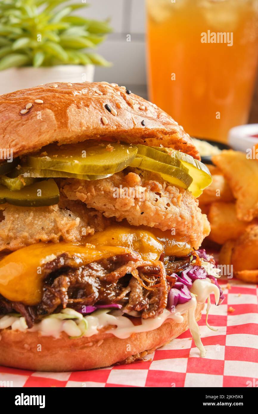 A vertical closeup shot of a big pulled pork sandwich Stock Photo - Alamy
