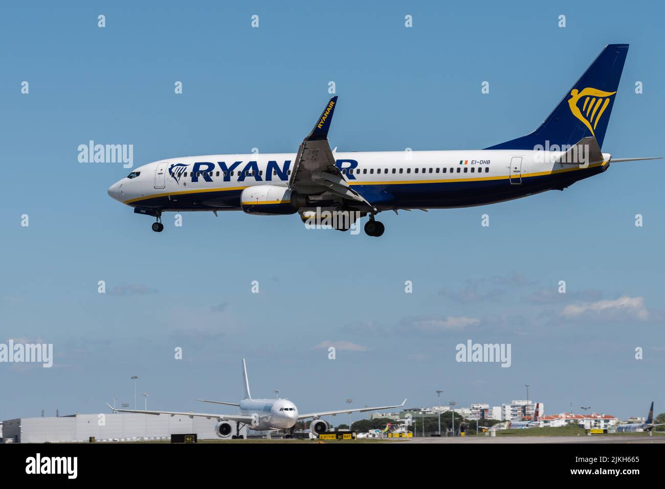 A Ryanair Boeing 737-8AS plane landing on Lisbon airport runway Stock ...