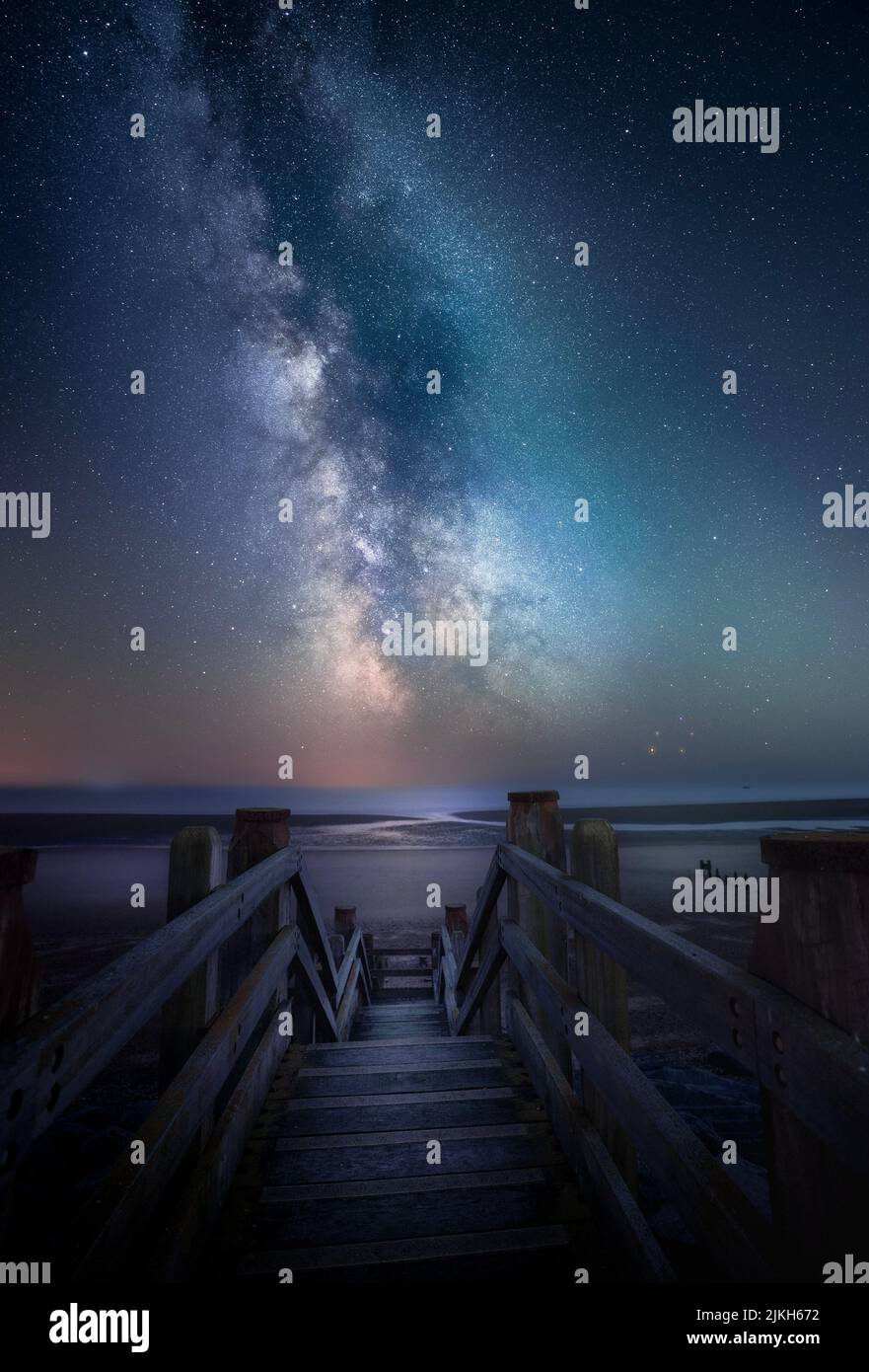 A path leading to the Camber sands beach. Magic nightscape with Milky ...