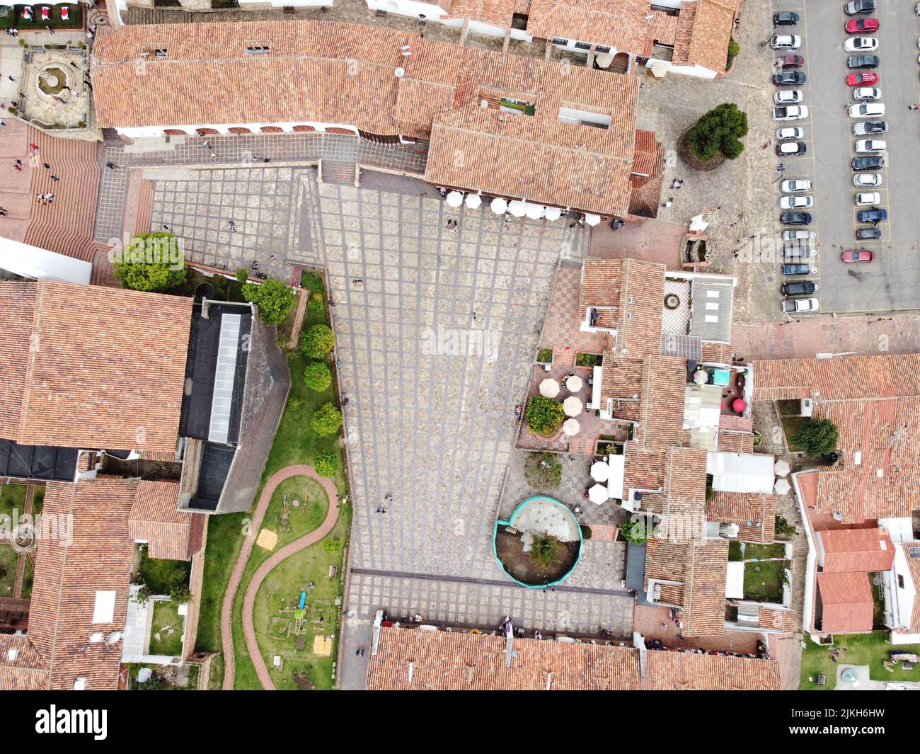 An aerial top view of buildings with brown roofs in a city Stock Photo ...
