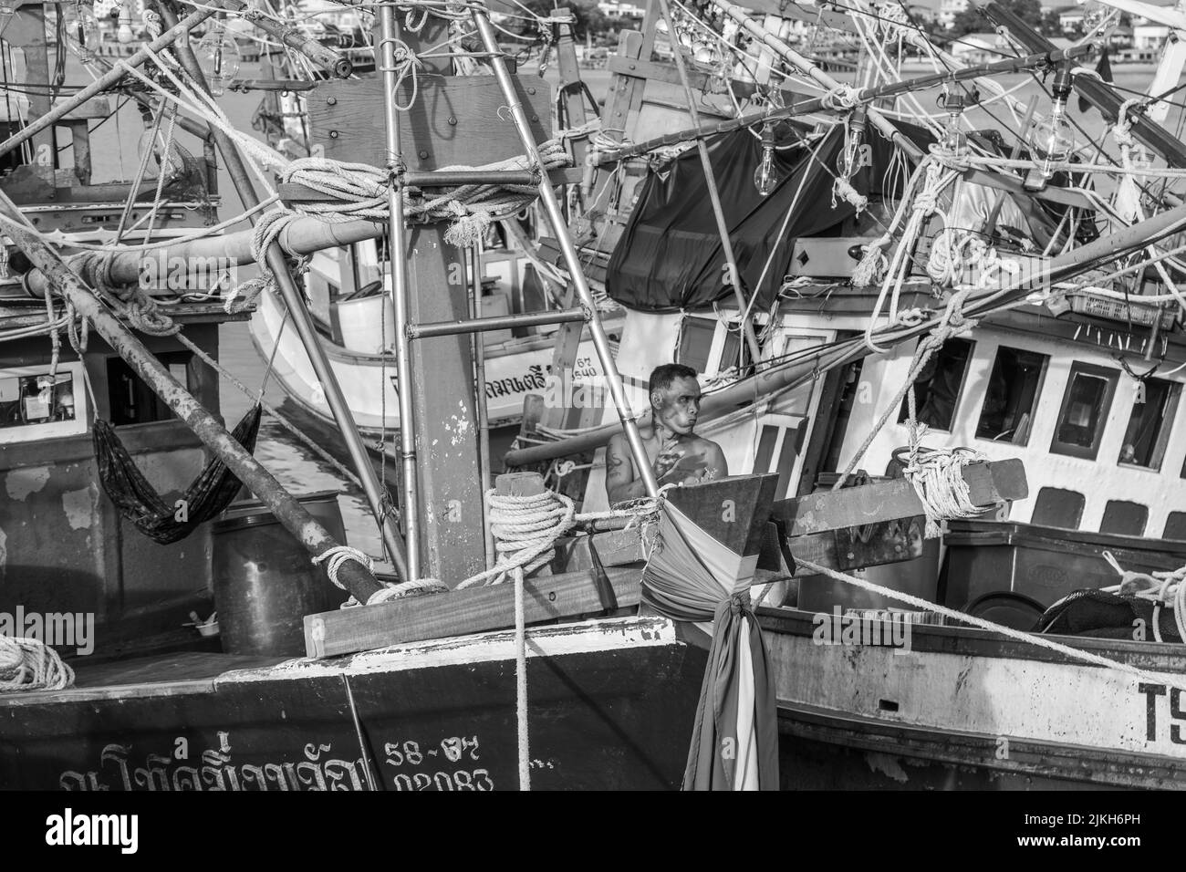 Thai fishing boat at a Pier in Thailand Southeast Asia Stock Photo - Alamy