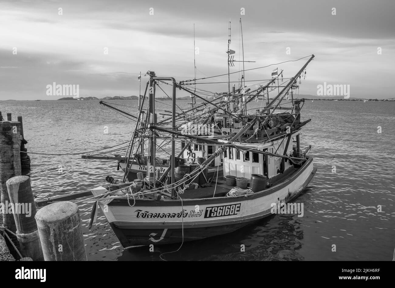Thai fishing boat at a Pier in Thailand Southeast Asia Stock Photo - Alamy