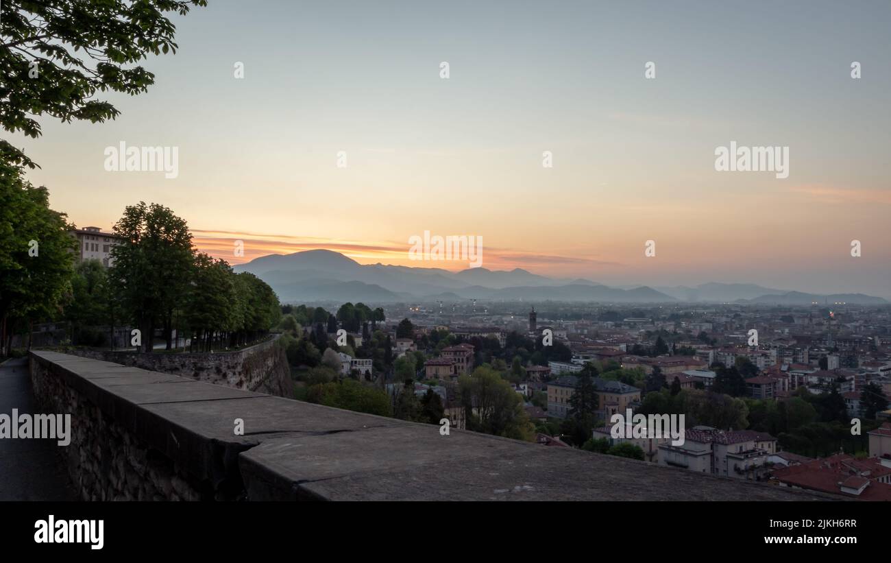 An aerial view of modern buildings at sunset in Bergamo, Italy Stock ...