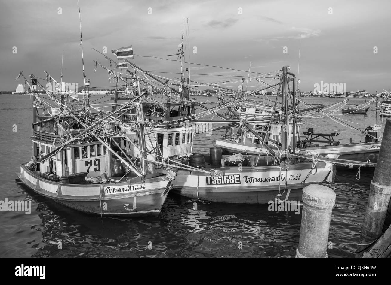 Thai fishing boat at a Pier in Thailand Southeast Asia Stock Photo - Alamy