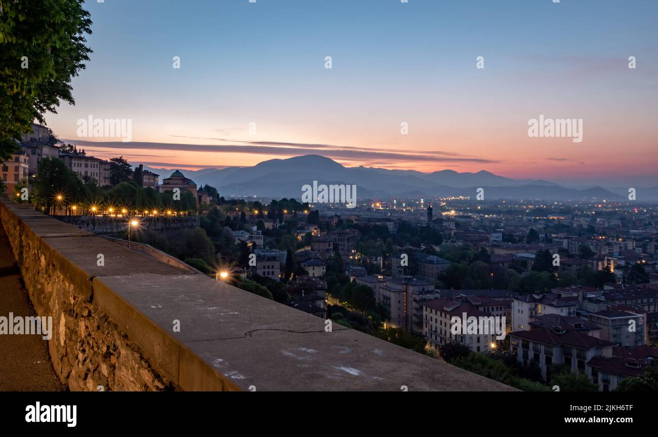 An aerial view of modern buildings at sunset in Bergamo, Italy Stock ...