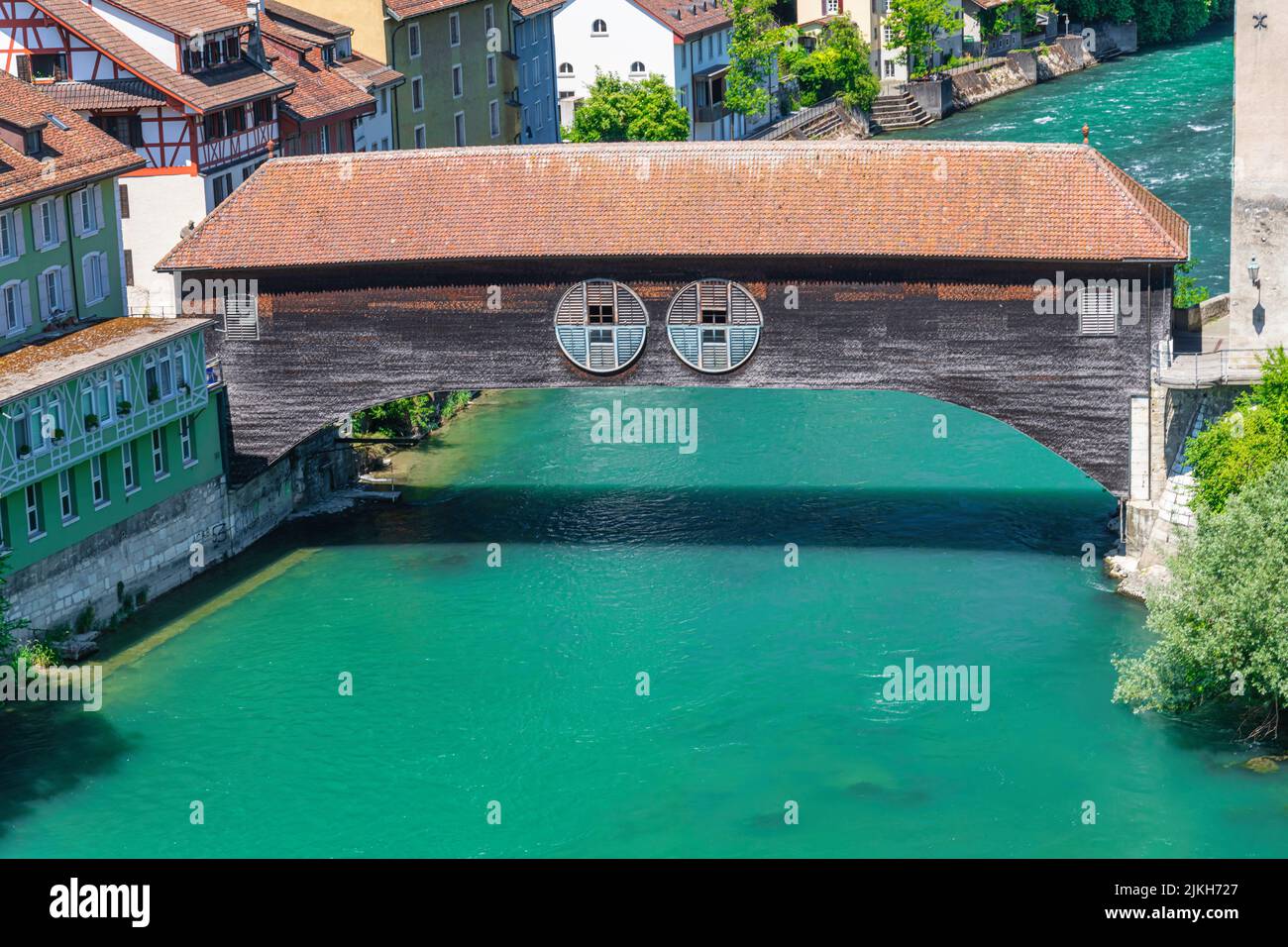 Swiss old town Baden on the river Limat with the traditional covered ...