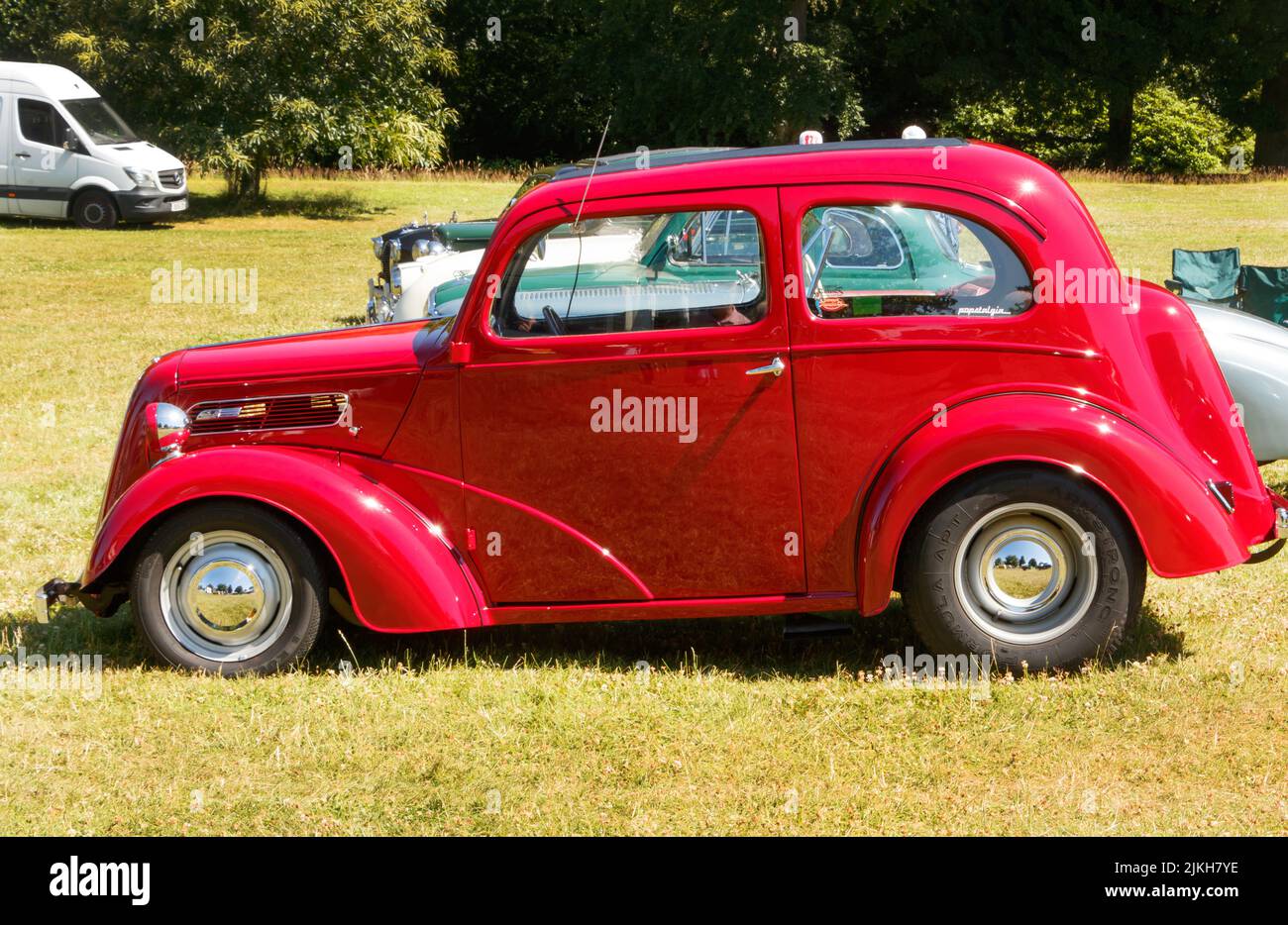 side view of bright red 1940s Ford Anglia Stock Photo - Alamy