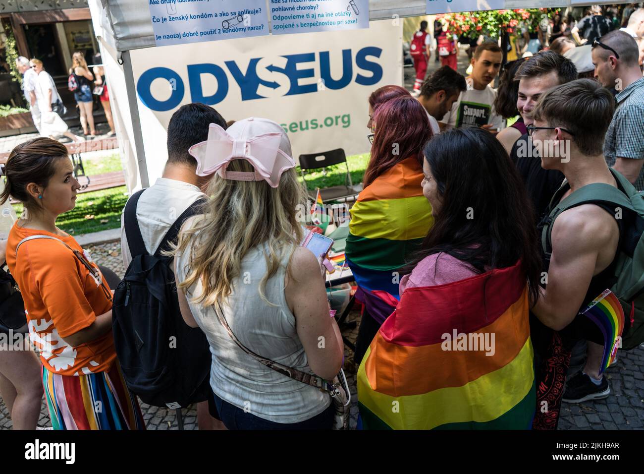 People march for equal rights for LGBTQ community with rainbow flags in ...