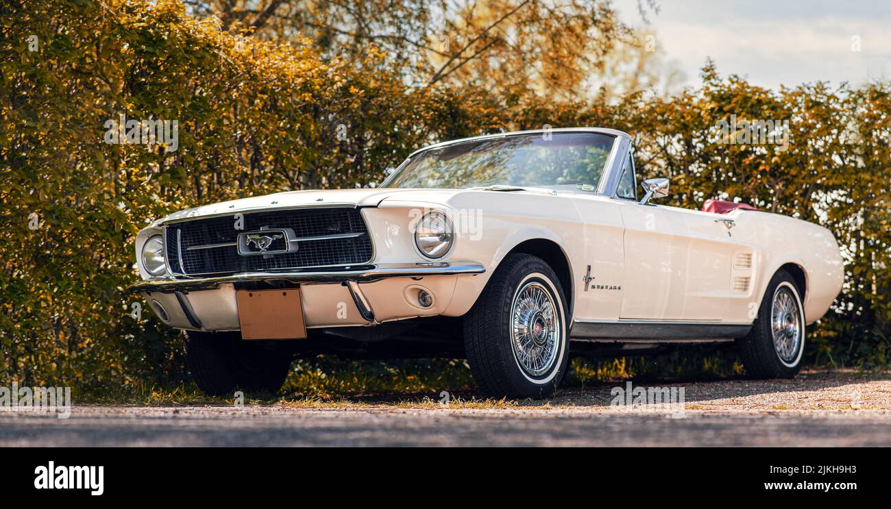 An old vintage Ford Mustang convertible classic car outdoors Stock Photo - Alamy