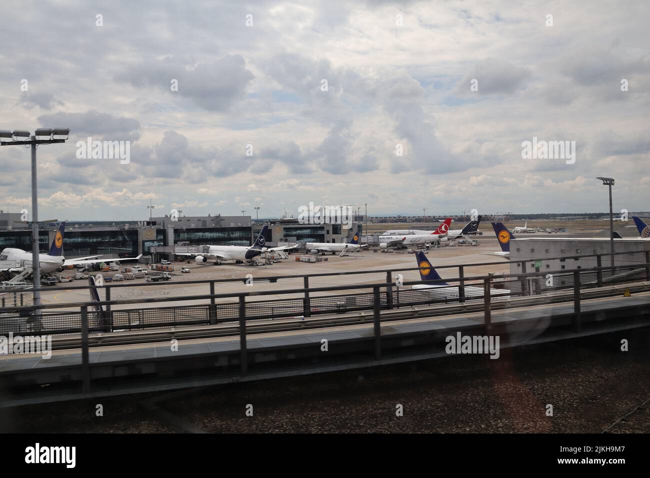 multiple airplanes at the airfield of the airport Stock Photo - Alamy