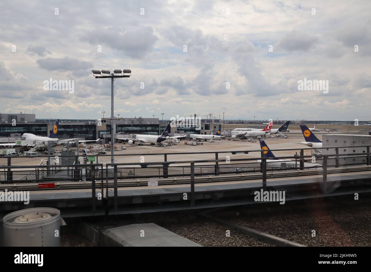 multiple airplanes at the airfield of the airport Stock Photo - Alamy