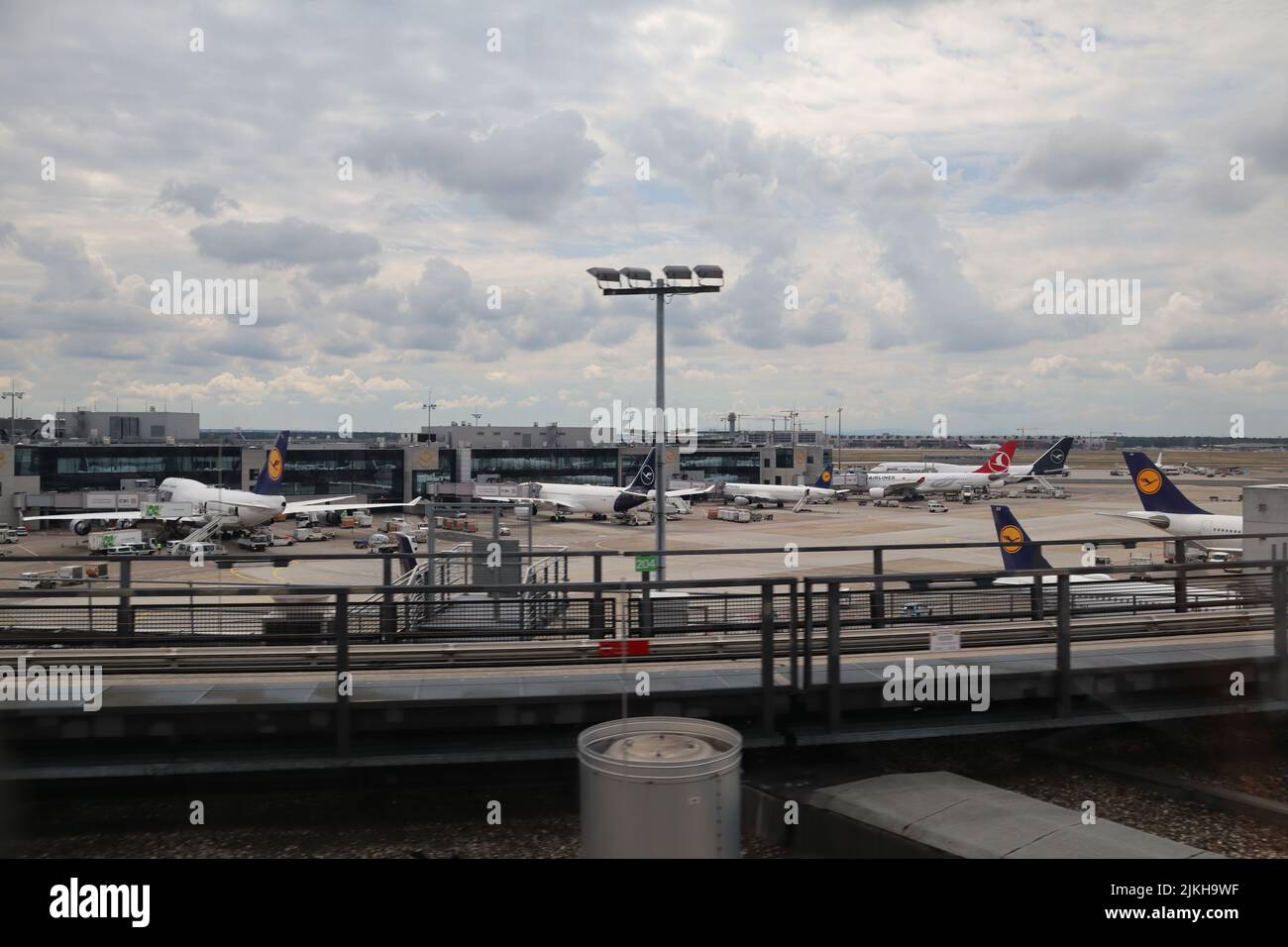multiple airplanes at the airfield of the airport Stock Photo - Alamy