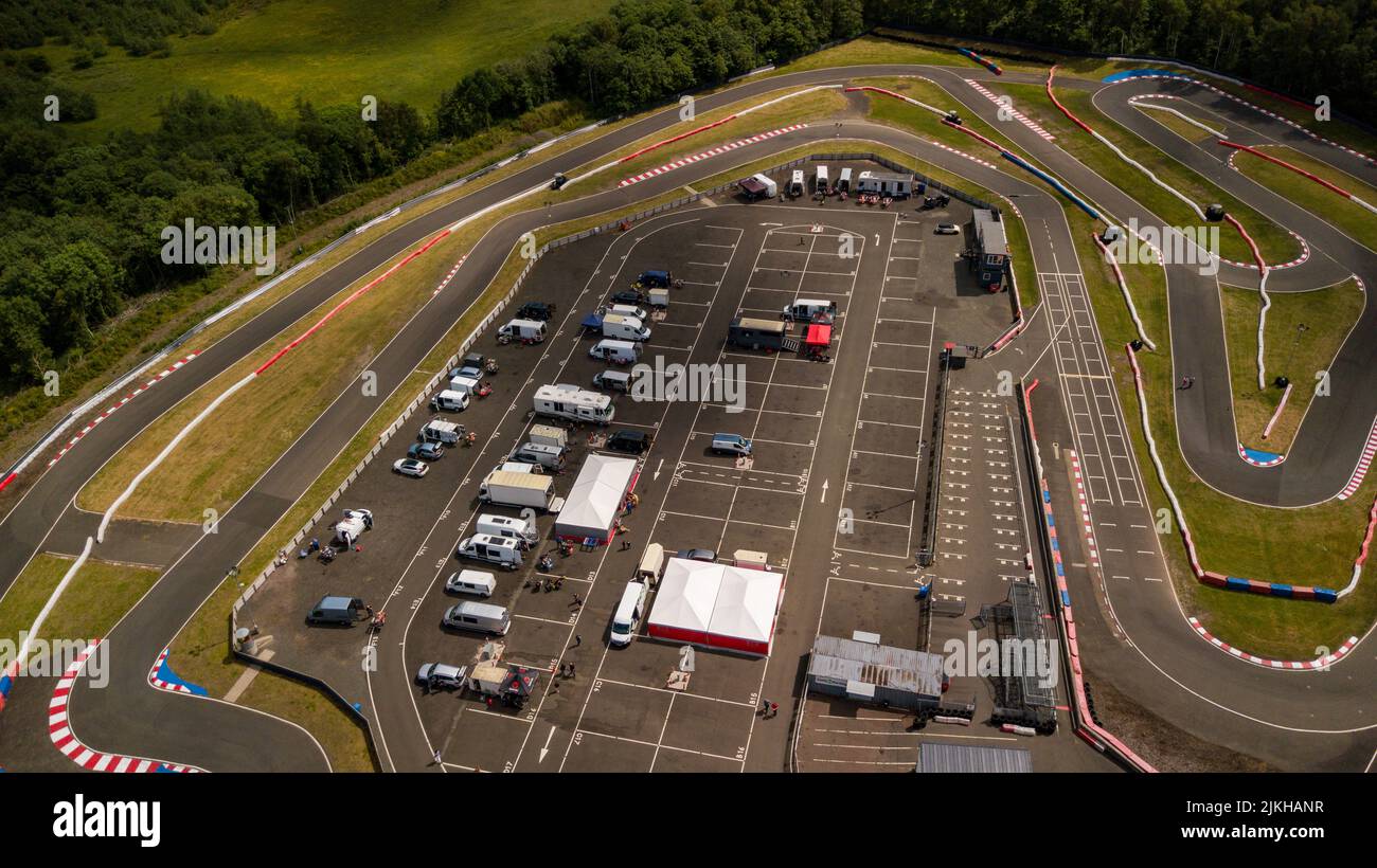 An aerial view of a racing track with parked cars Stock Photo - Alamy